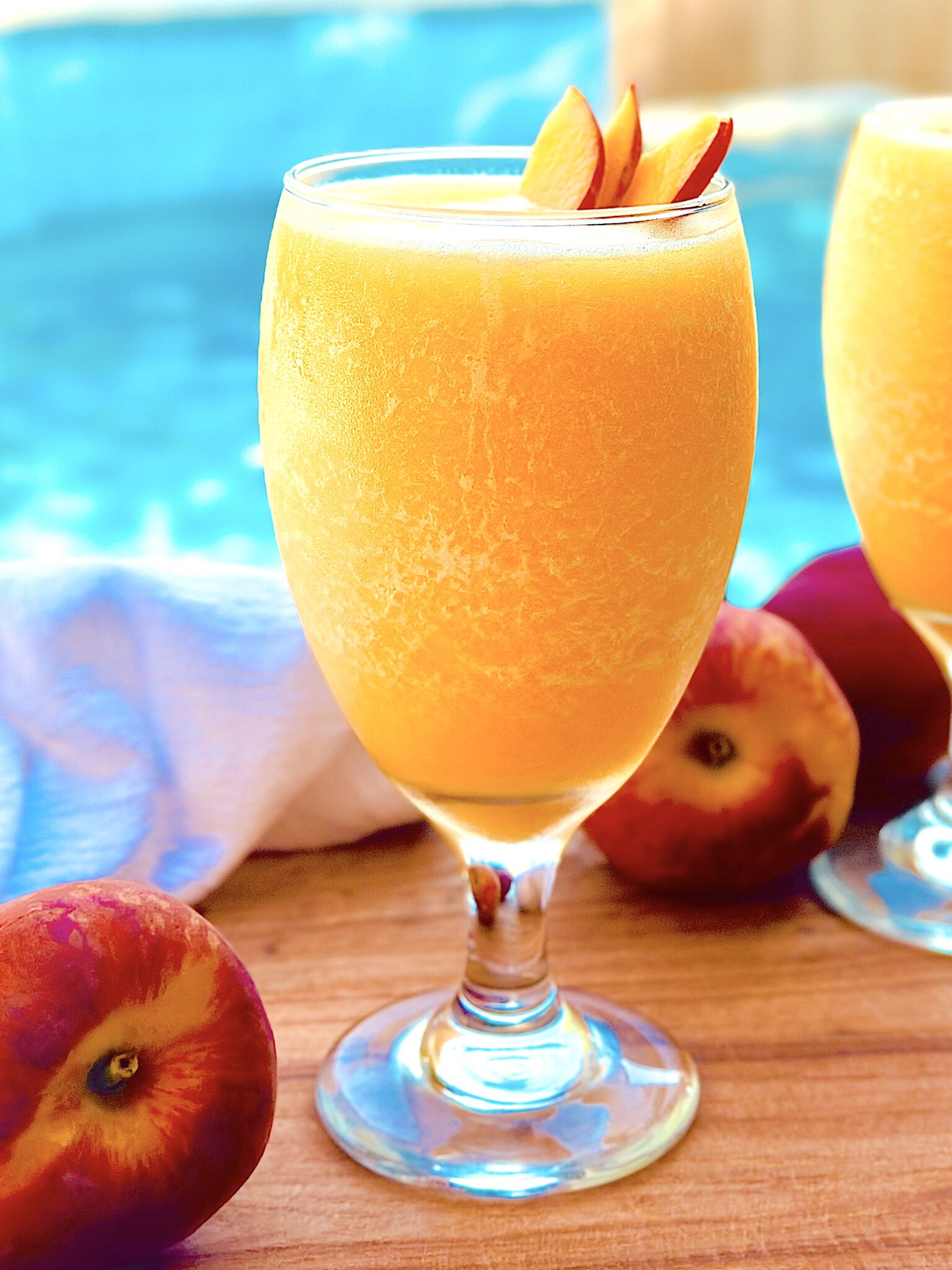 Easy Frozen Peach Bellinis | Jennifer Cooks